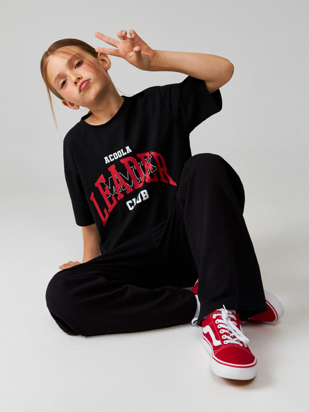 Футболка Девочки Acoola черный кристалл Короткий, размер 134 Трикотаж Надписи прямой ...