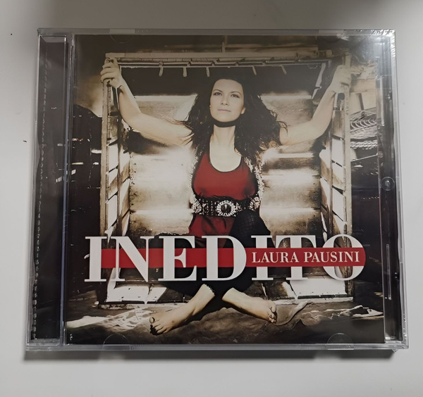 Laura Pausini Inedito CD Лора Пуччини купить на OZON по низкой цене ...