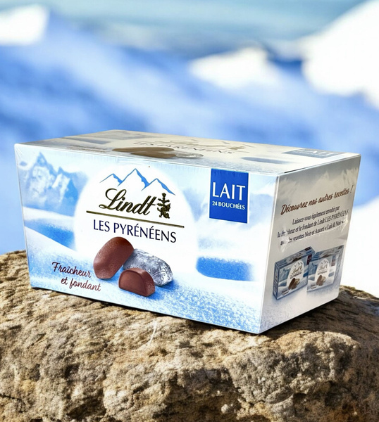 Шоколадные конфеты Lindt LES PYRENEENS из молочного шоколада с начинкой ...