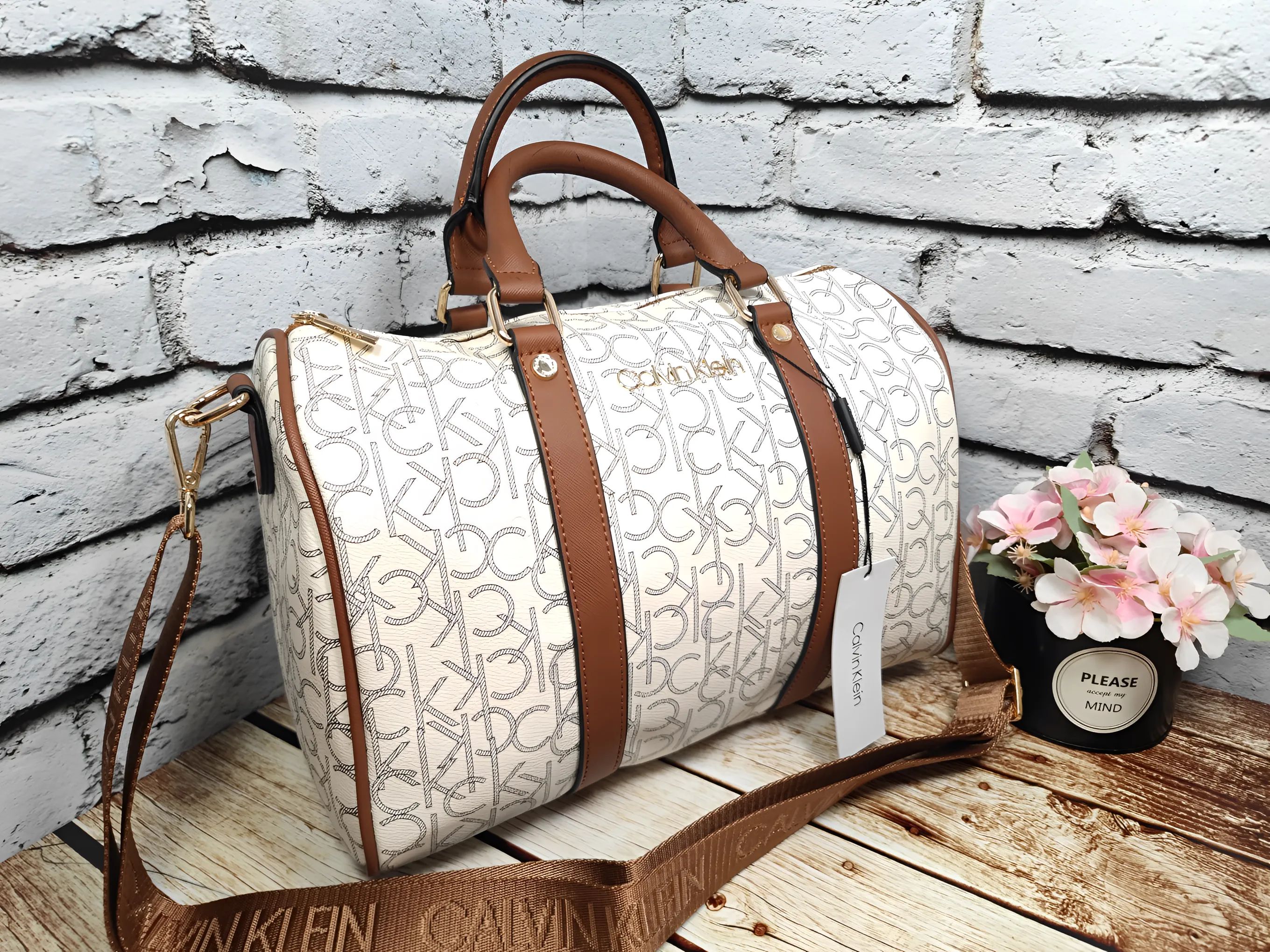 Calvin klein monogram duffle bag store