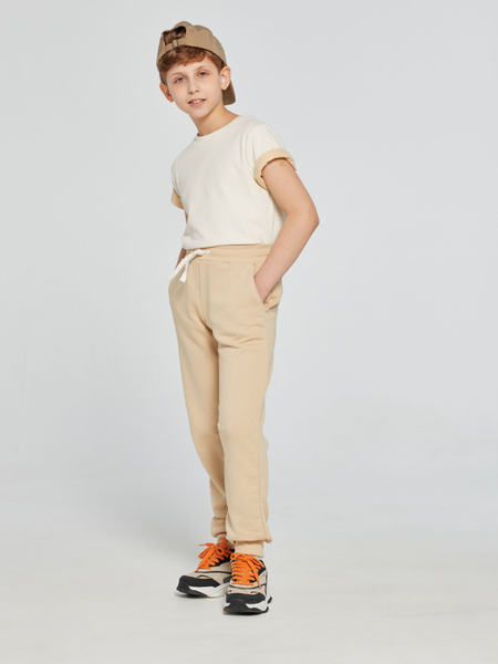 Брюки Девочки, Мальчики OLDOS экрю, бежевый Хлопок, Полиэстер Спортивный, размер 146 свободный ...