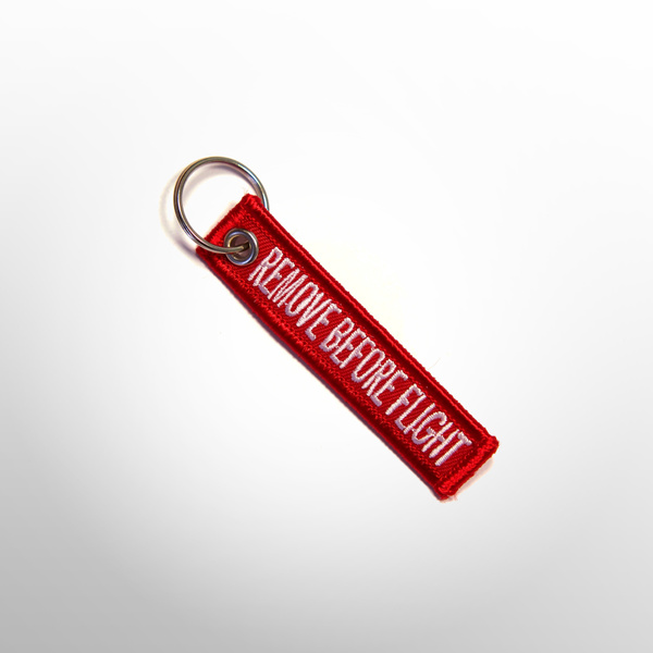 Микро брелок Remove Before Flight красный купить на OZON по низкой цене (503707612)