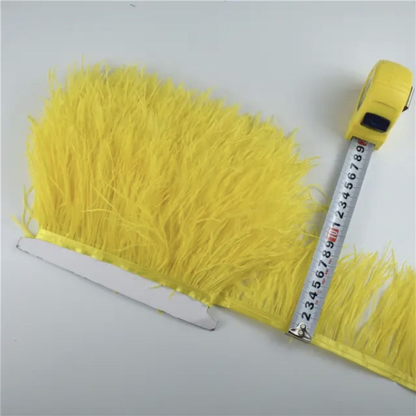 Перья страуса на ленте желтые 1 метр - купить с доставкой по выгодным ...